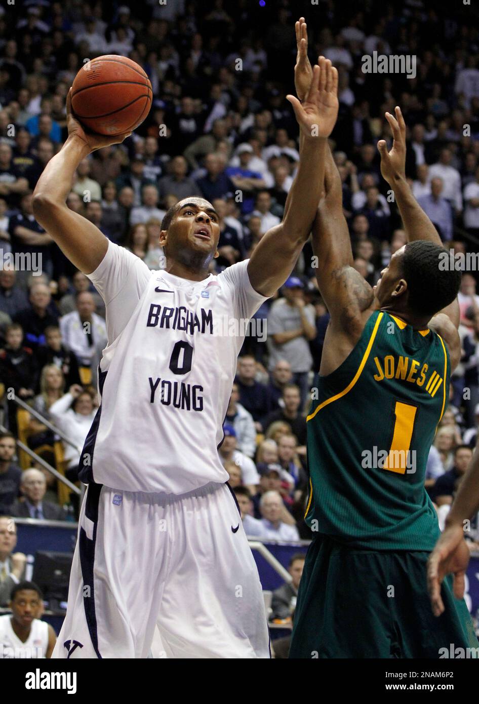 BYU forward Brandon Davies (0) shoots over Baylor forward Perry Jones ...