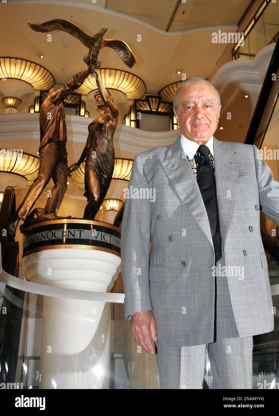 Harrods chairman Mohamed Al Fayed unveils a new memorial statue, seen ...