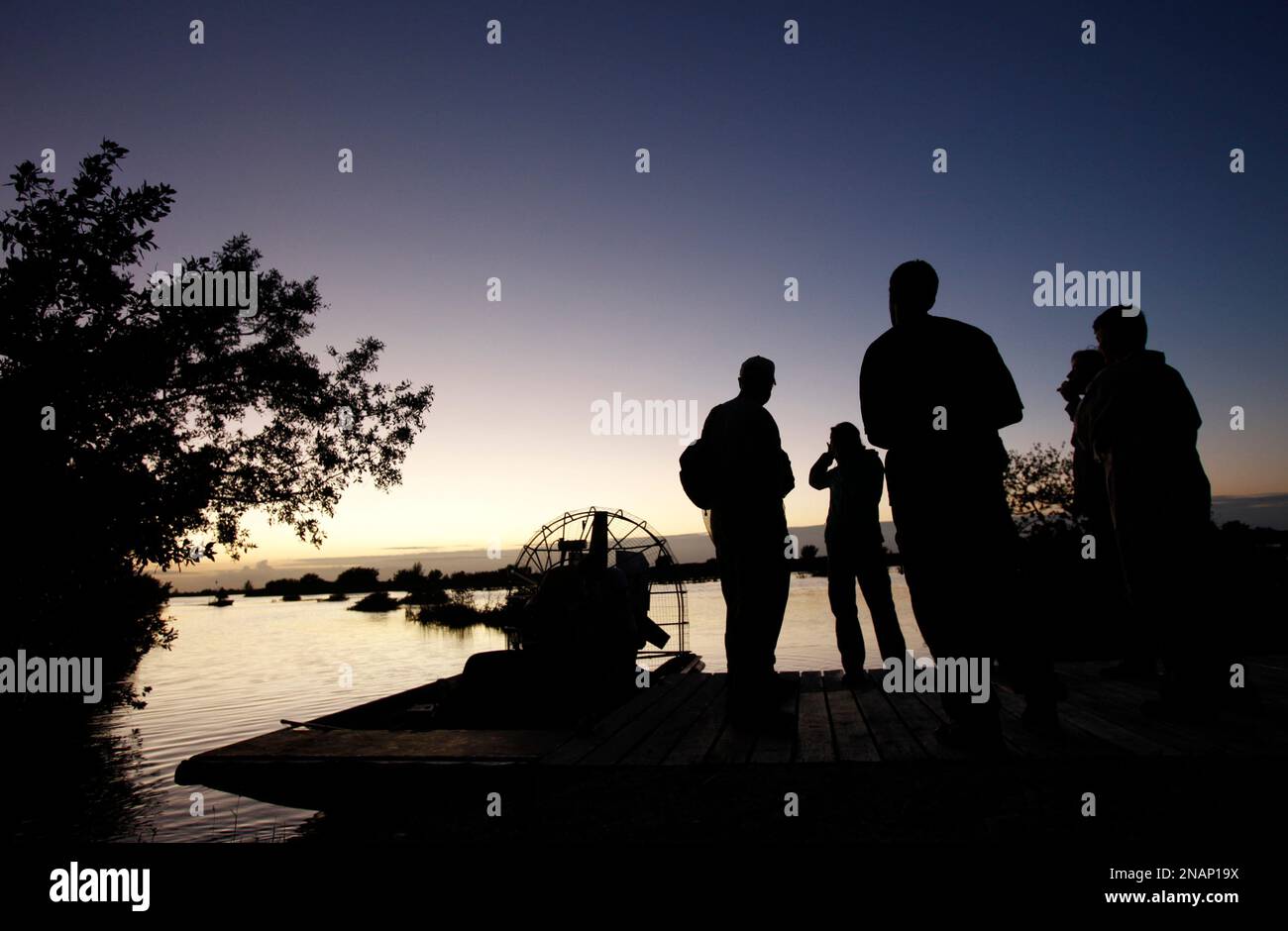 In this Nov. 28, 2011 photo, wildlife biologists gather waiting for ...