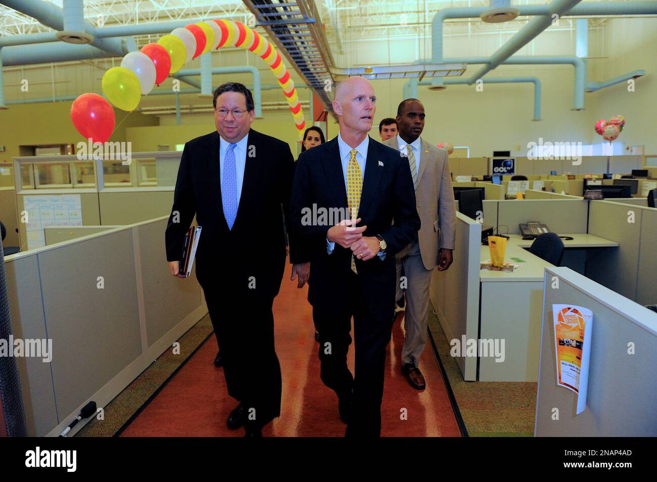 Florida Gov. Rick Scott, right, joins Comcast Corporation executive ...