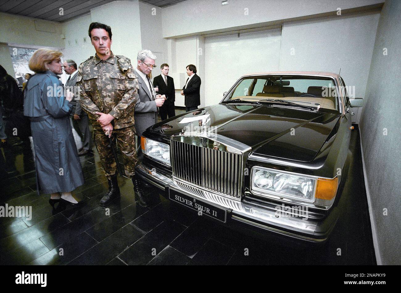 A Russian armed guard in a camouflage uniform keeps a watchful eye at a ...