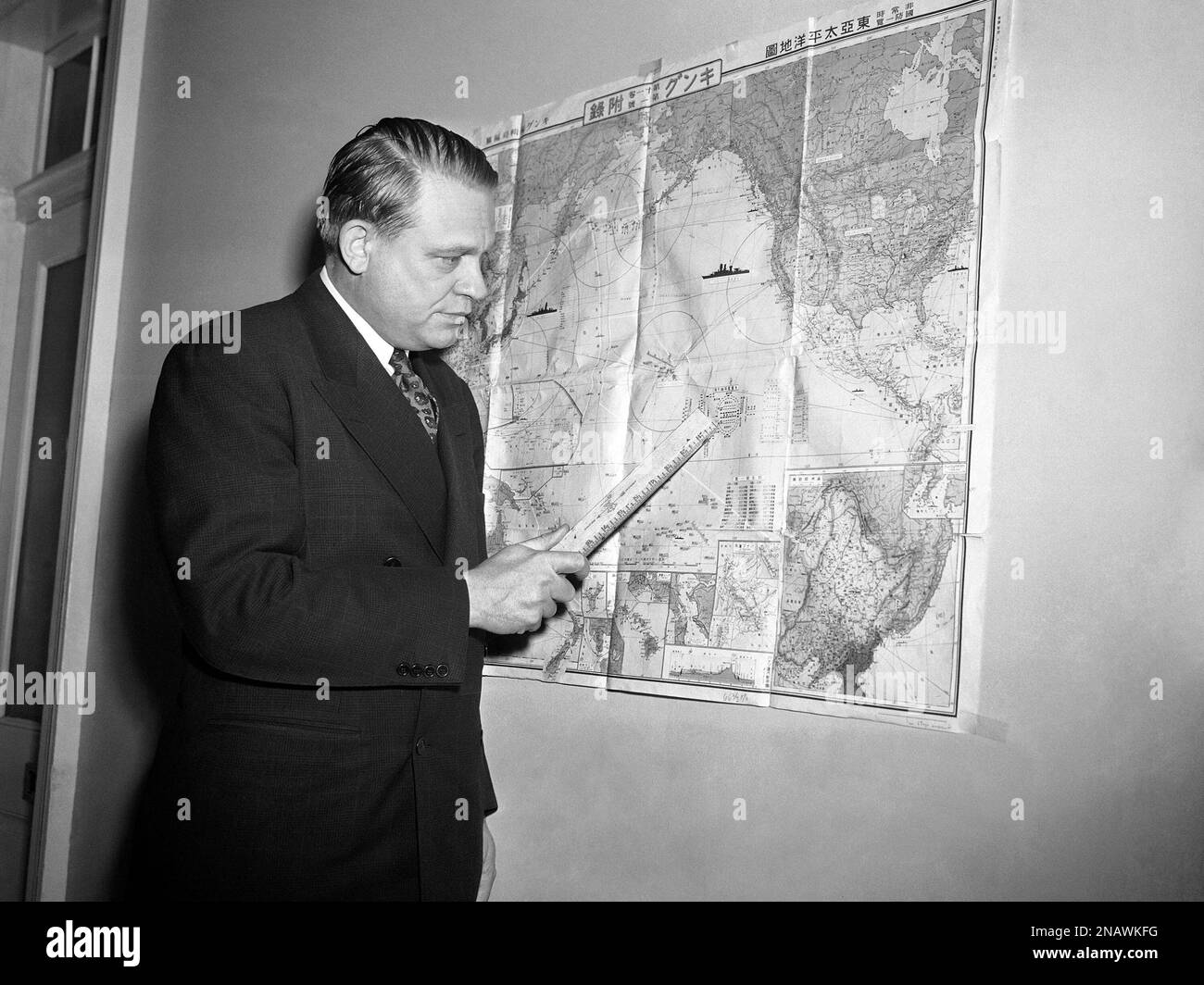 Rep. Martin Dies (D-Texas) in Washington on Feb. 27, 1942, views a ...