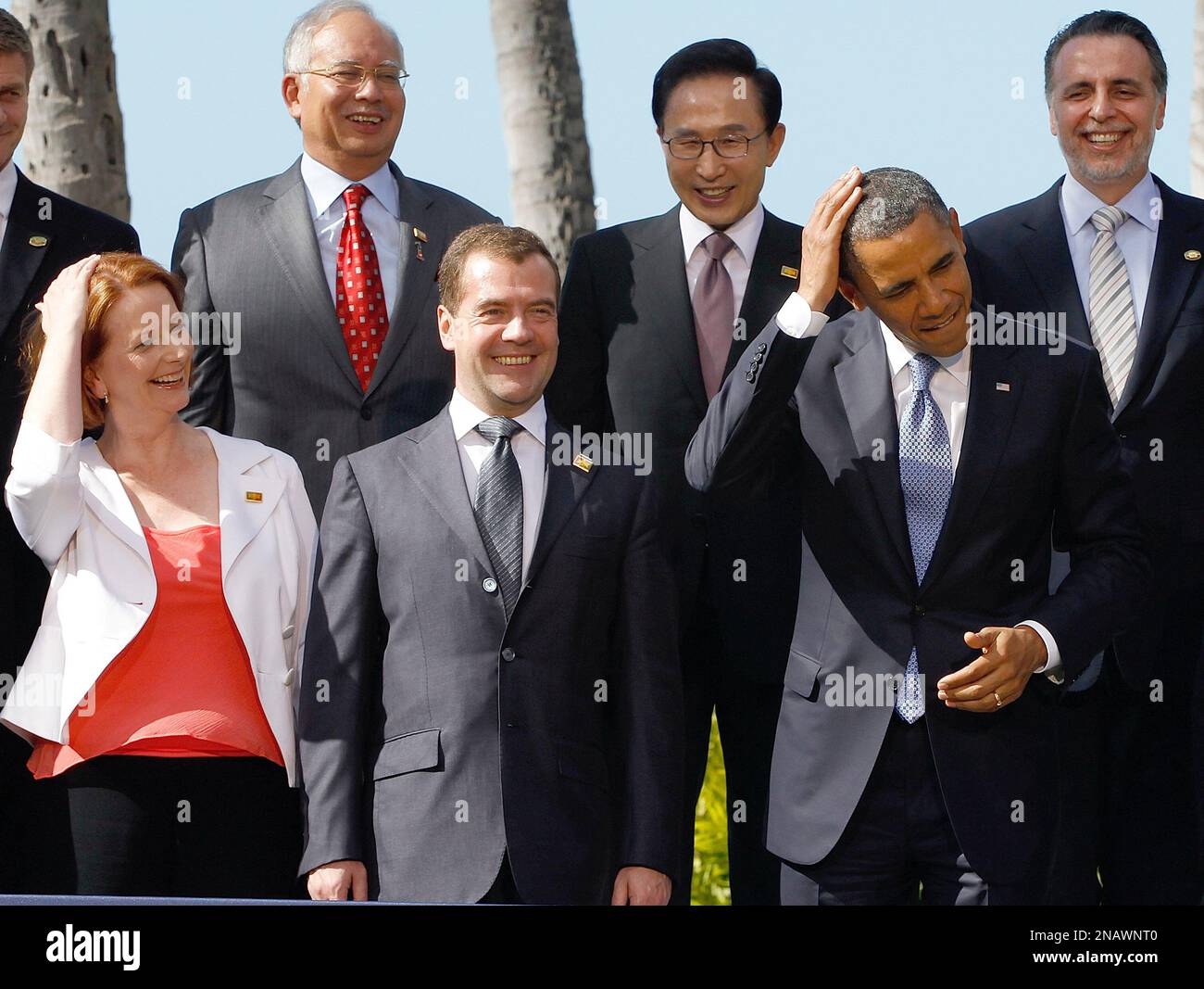 Australian Prime Minister Julia Gillard, left, and U.S. President Barack Obama, right, laugh as ...