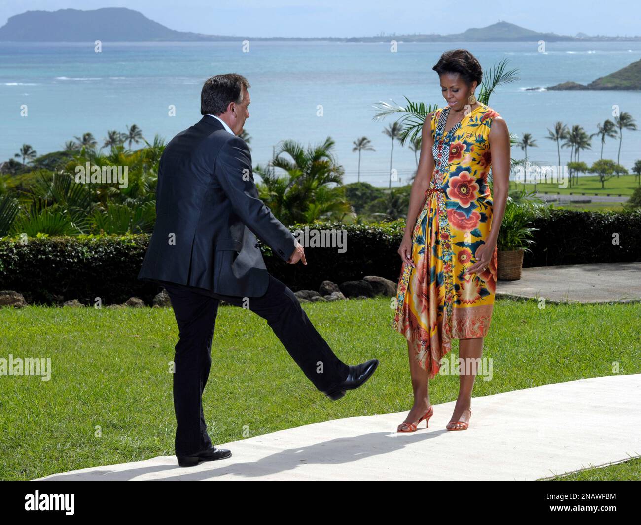 First lady Michelle Obama greets Tim Mathieson, domestic partner of ...