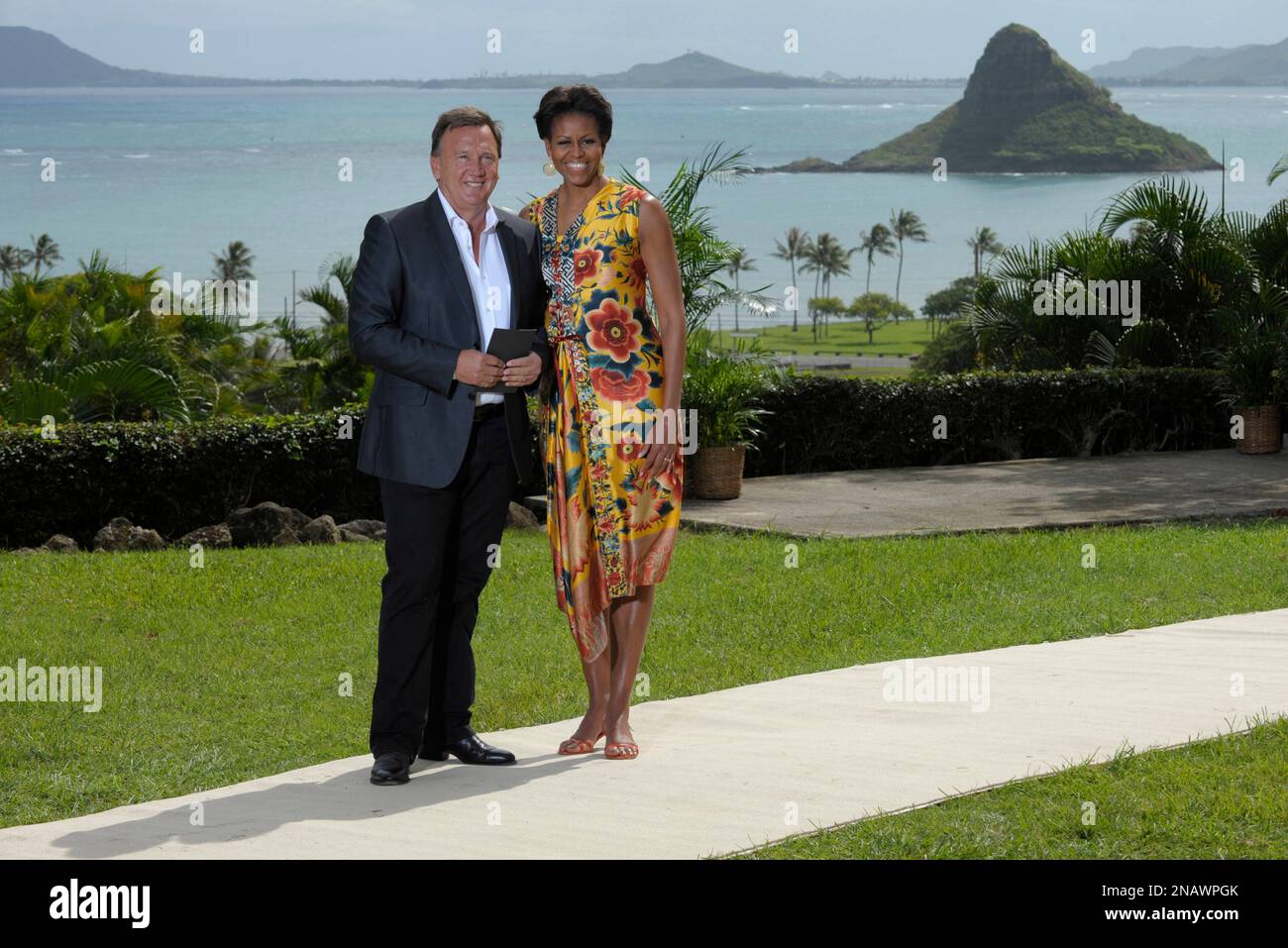 First lady Michelle Obama greets Tim Mathieson, domestic partner of ...