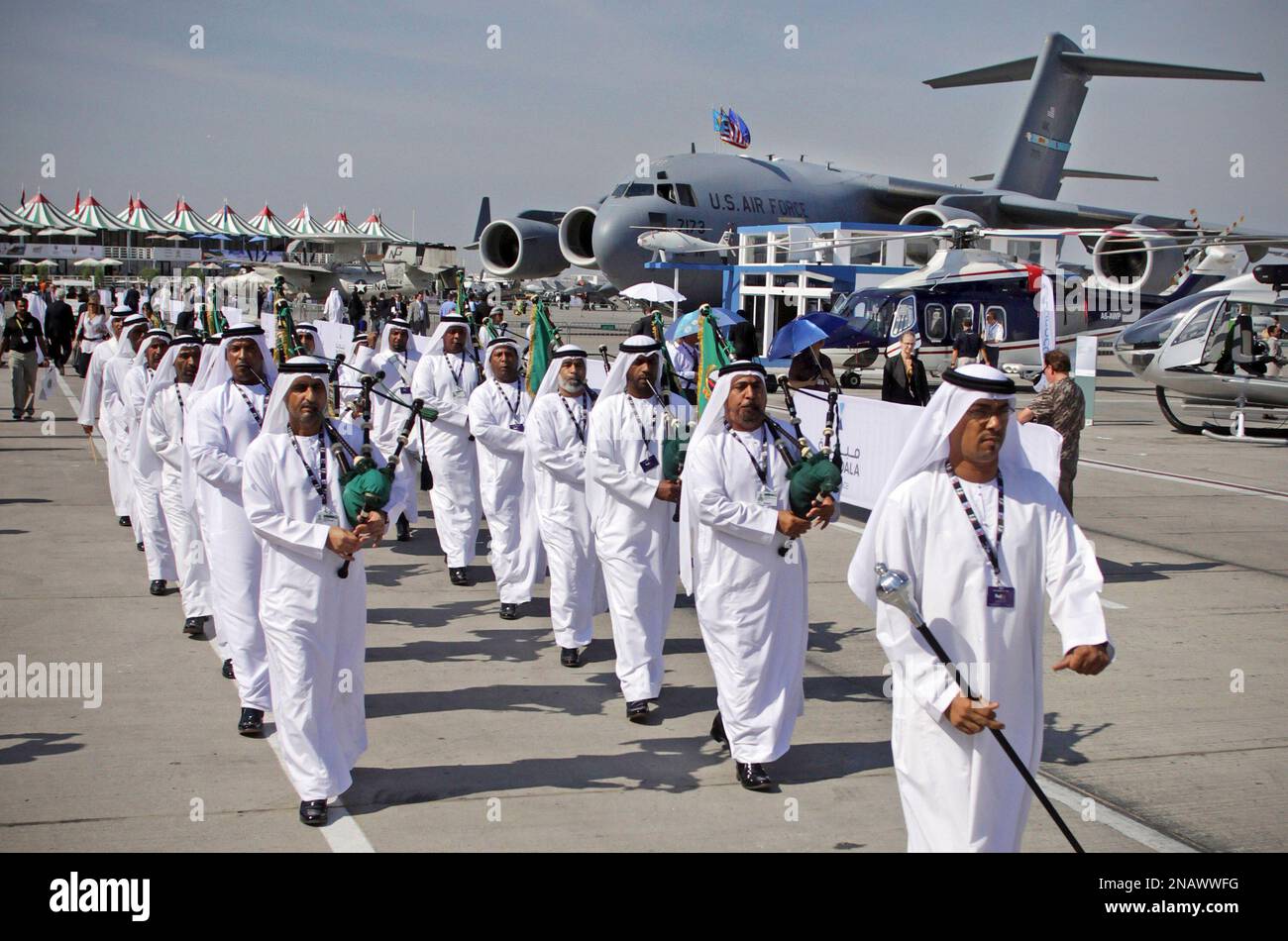 Members of the Dubai police band march at the Dubai airshow in Dubai ...