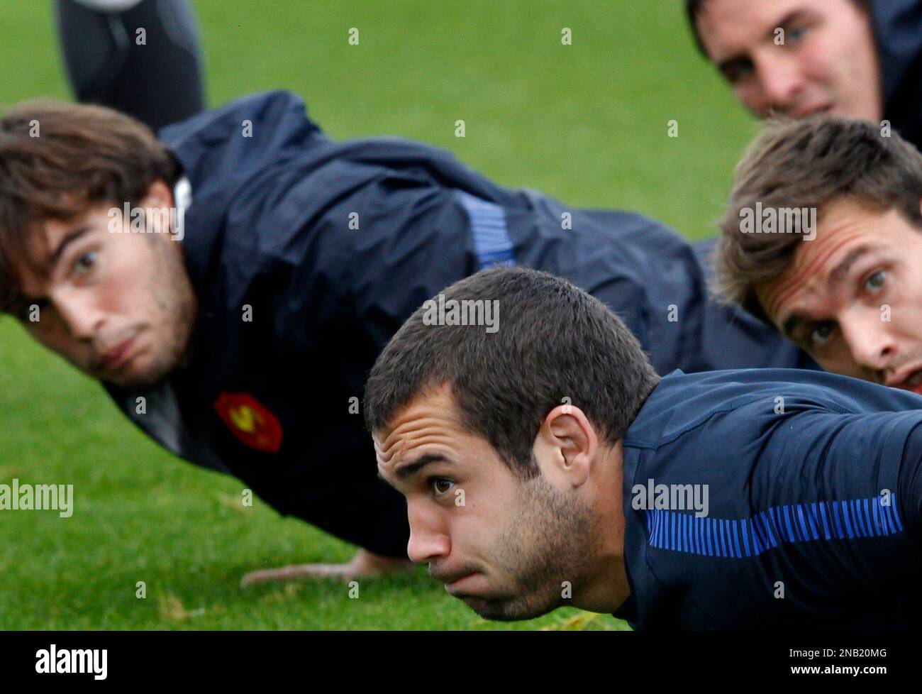 French rugby players, from left, Alexis Palisson, Jean Marc Doussain ...