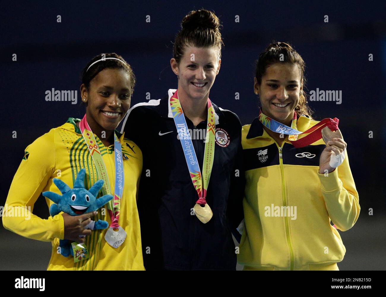Athletes, from left to right, Jamaica's Alia Atkinson, silver medal ...