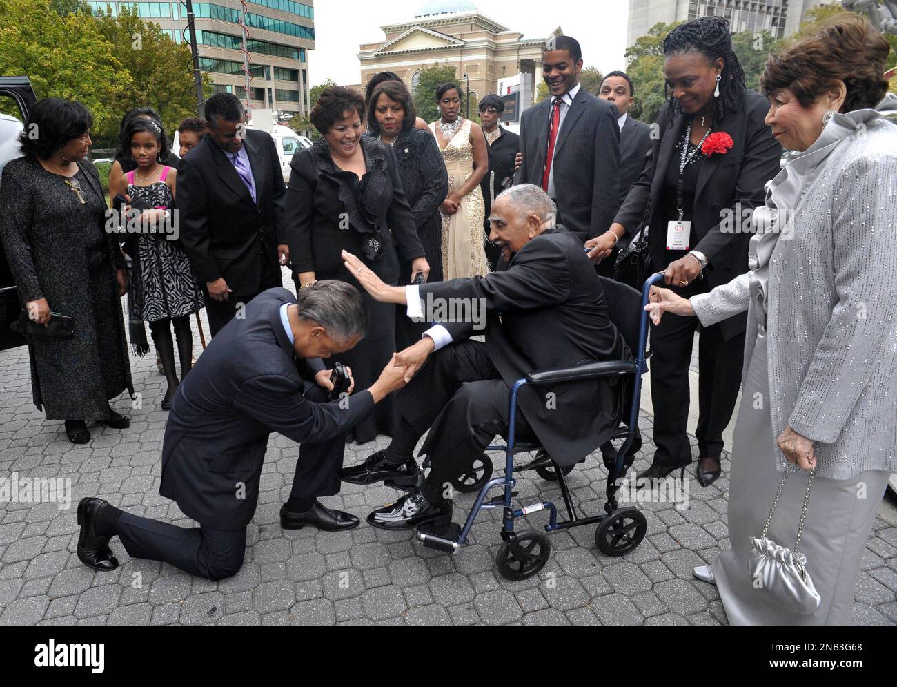 Civil rights activists Rev. Joseph E. Lowery, pats bowing Rev. Al ...