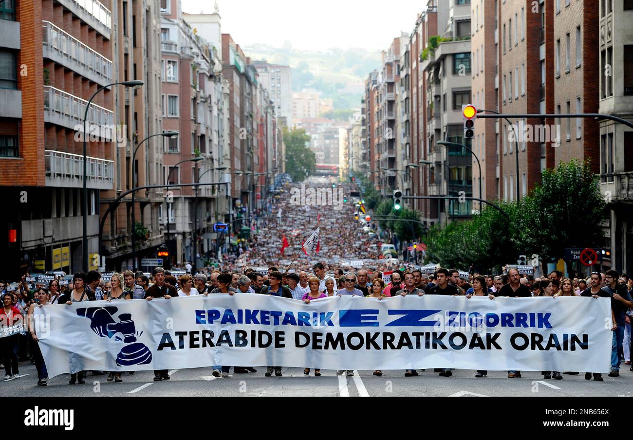 Demonstrators march during a protest rally in Bilbao, northern Spain ...