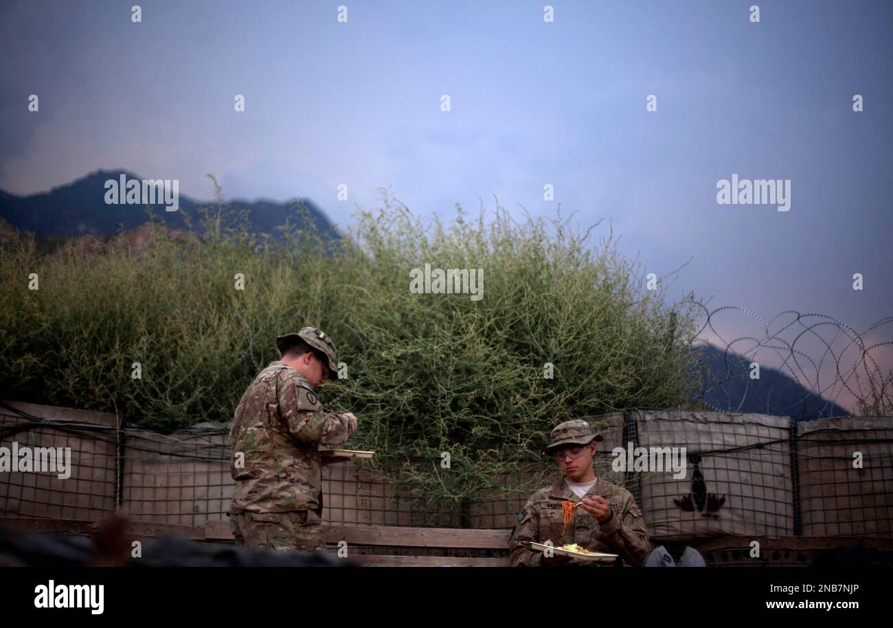 Pfc. Jason Garcia, of Orange County Calif., right, and Spc. Nathan ...