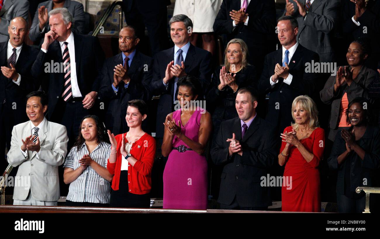Guests in the first lady's box applaud during the speech by President ...