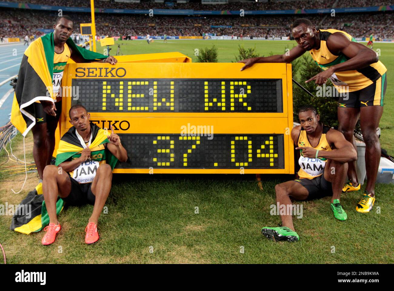 Jamaica's Usain Bolt, right top, Yohan Blake, right bottom, Nest Carter, left top, and Michael ...