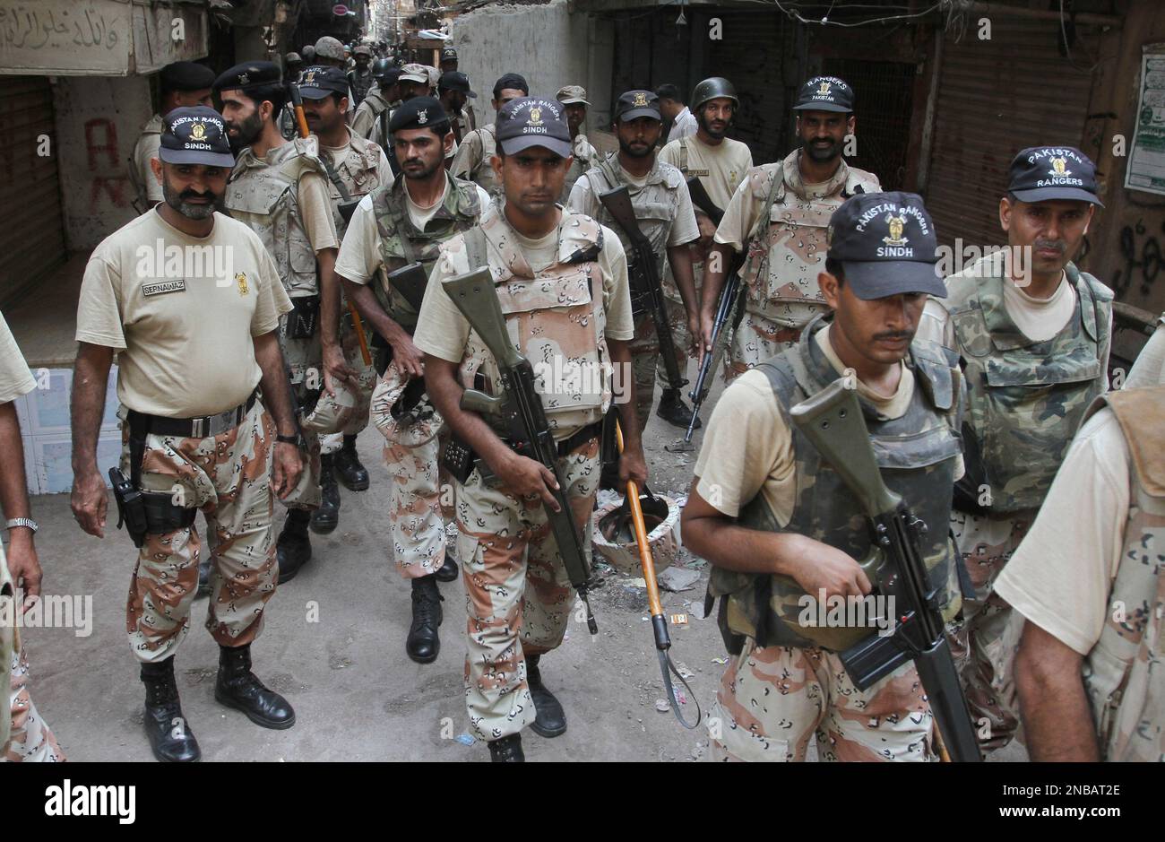Pakistani paramilitary troops leave after a crackdown operation against ...