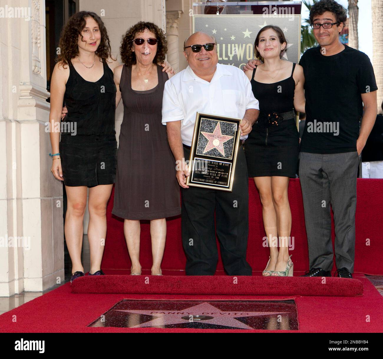 Actor Danny DeVito, middle, poses with his star and his family, from ...