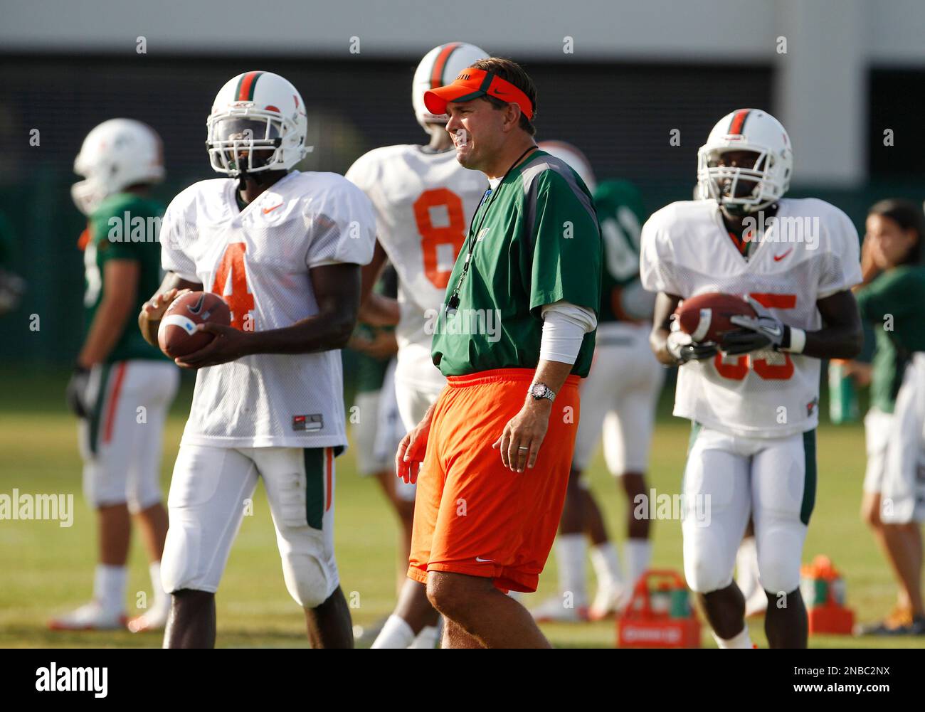 Miami's head football coach Al Golden, center, is shown during football ...
