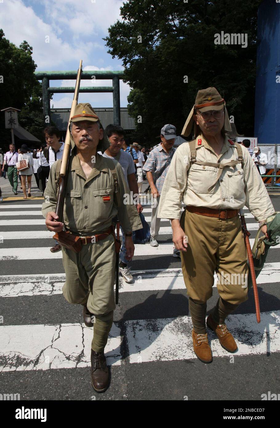 Men in Japanese Imperial Army uniform parade at the Yasukuni Shrine in ...