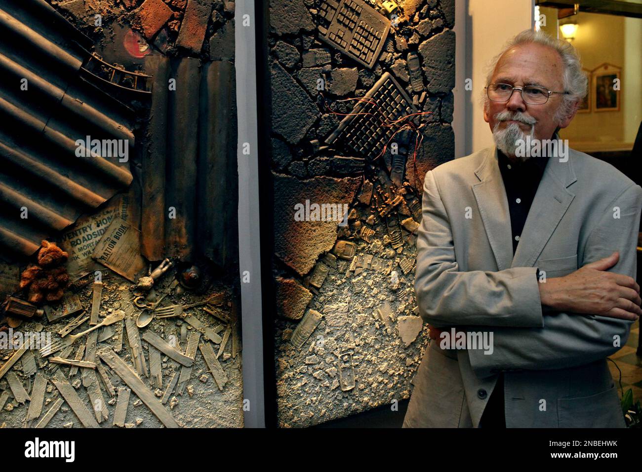 British artist Roy Ray stands by his artwork at St. Peter's Church near ...