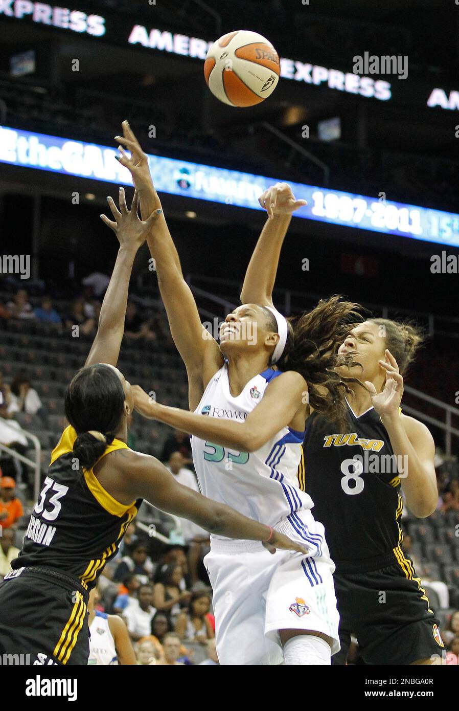 New York Liberty forward Plenette Pierson, center, gets a shot ...