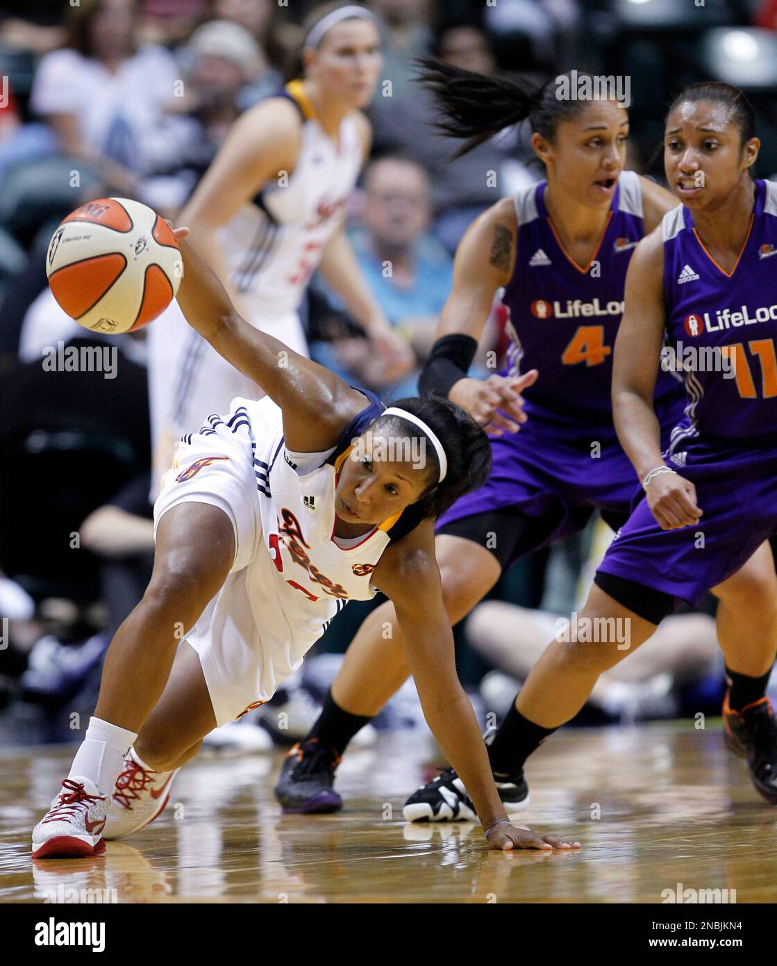Indiana Fever guard Briann January, left, goes to the floor to control ...