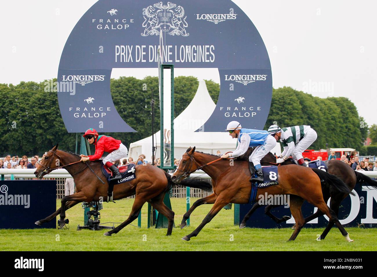 French jockey Maxime Guyon, left, rides Golden Lilac to victory to win ...