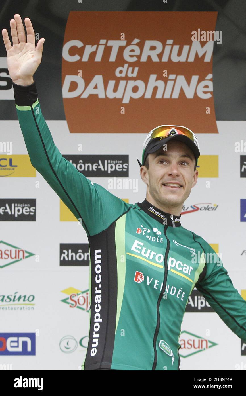 Christophe Kern, of France, celebrates on the podium after winning the ...