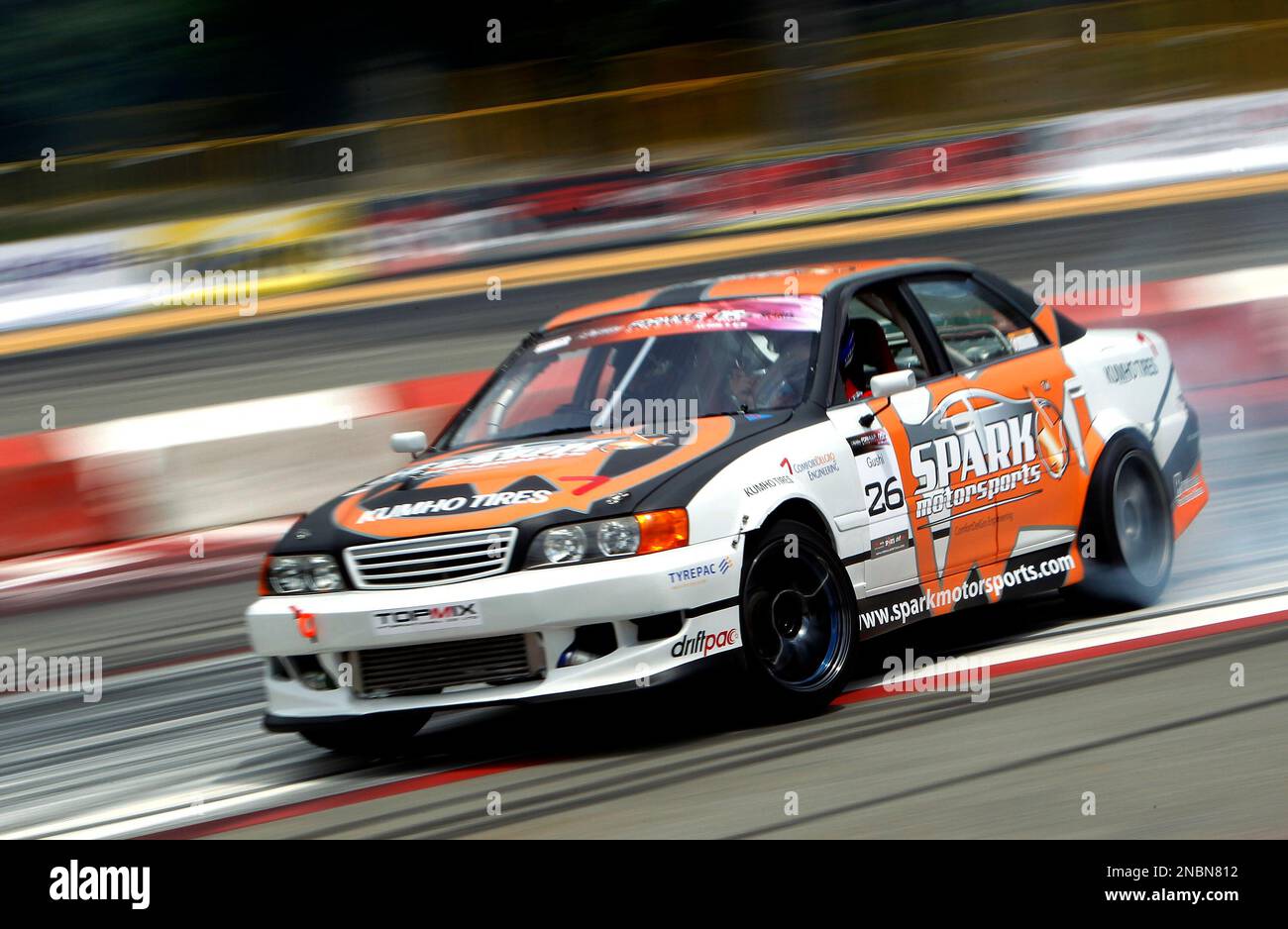 Ken Gushi of the United States performs during a drifting demonstration ...
