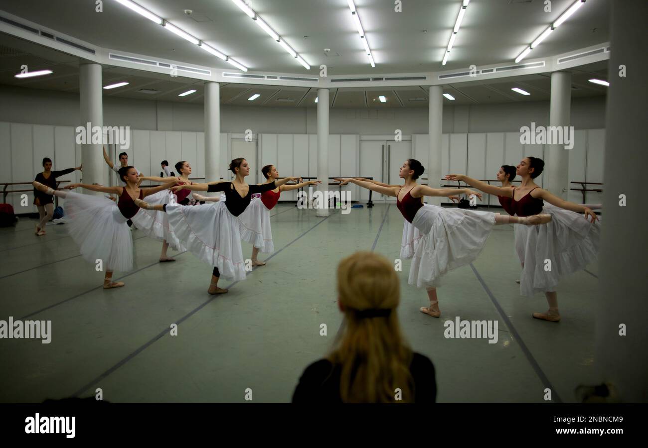 Ballet teacher Claudia Miguel watches her students rehearse at the ...