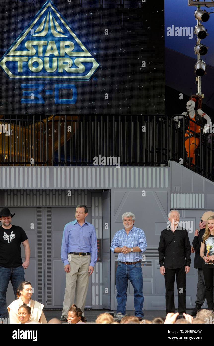 Disney CEO Robert Iger, second from left, Star Wars creator George ...