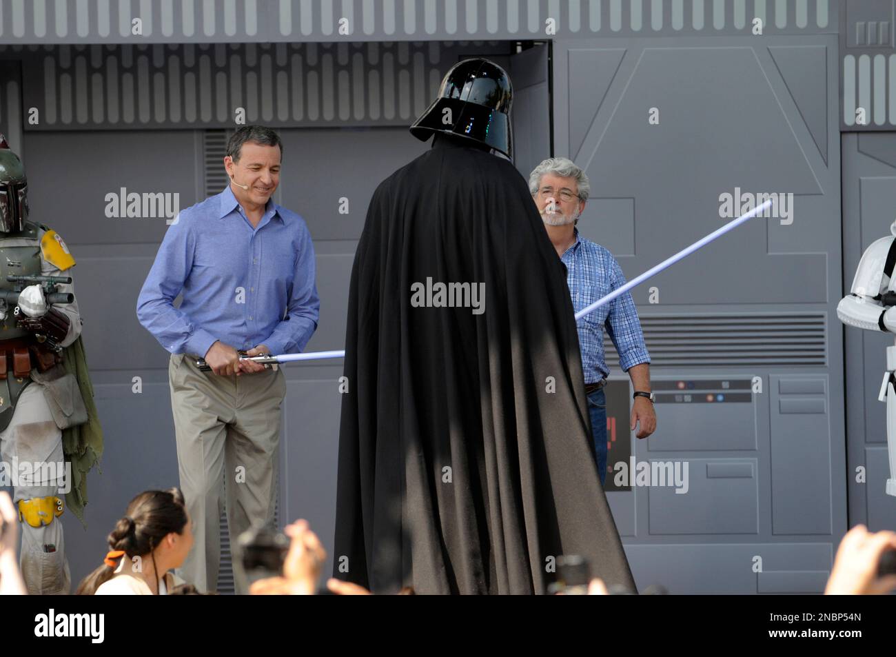 Disney CEO Robert Iger, second from left, and Star Wars creator George ...