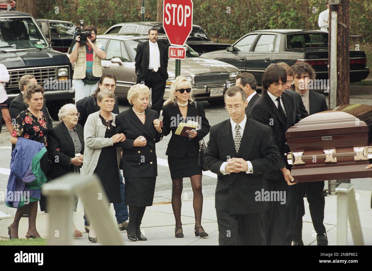 Pallbearers carry the casket of tennis star Vitas Gerulaitis, followed ...
