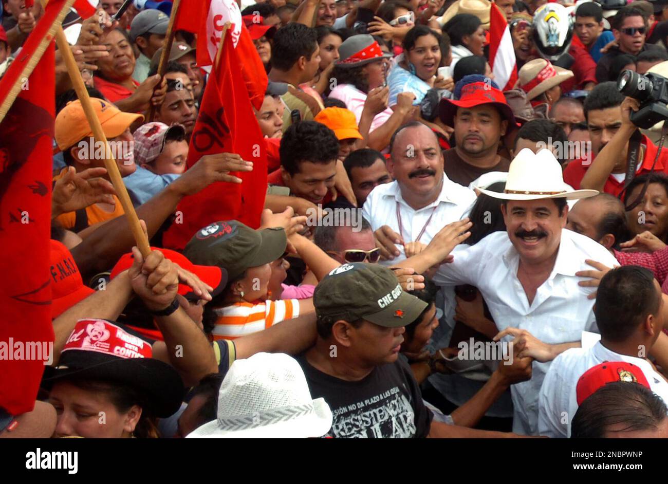 Ousted former Honduras' President Manuel Zelaya, right, greets ...