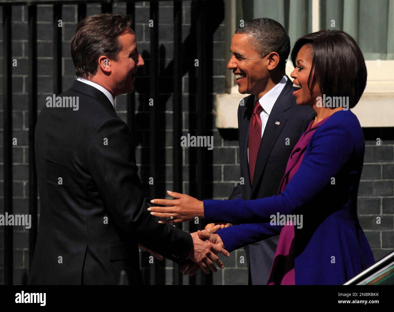 Britain's Prime Minister David Cameron, left, and his wife Samantha ...