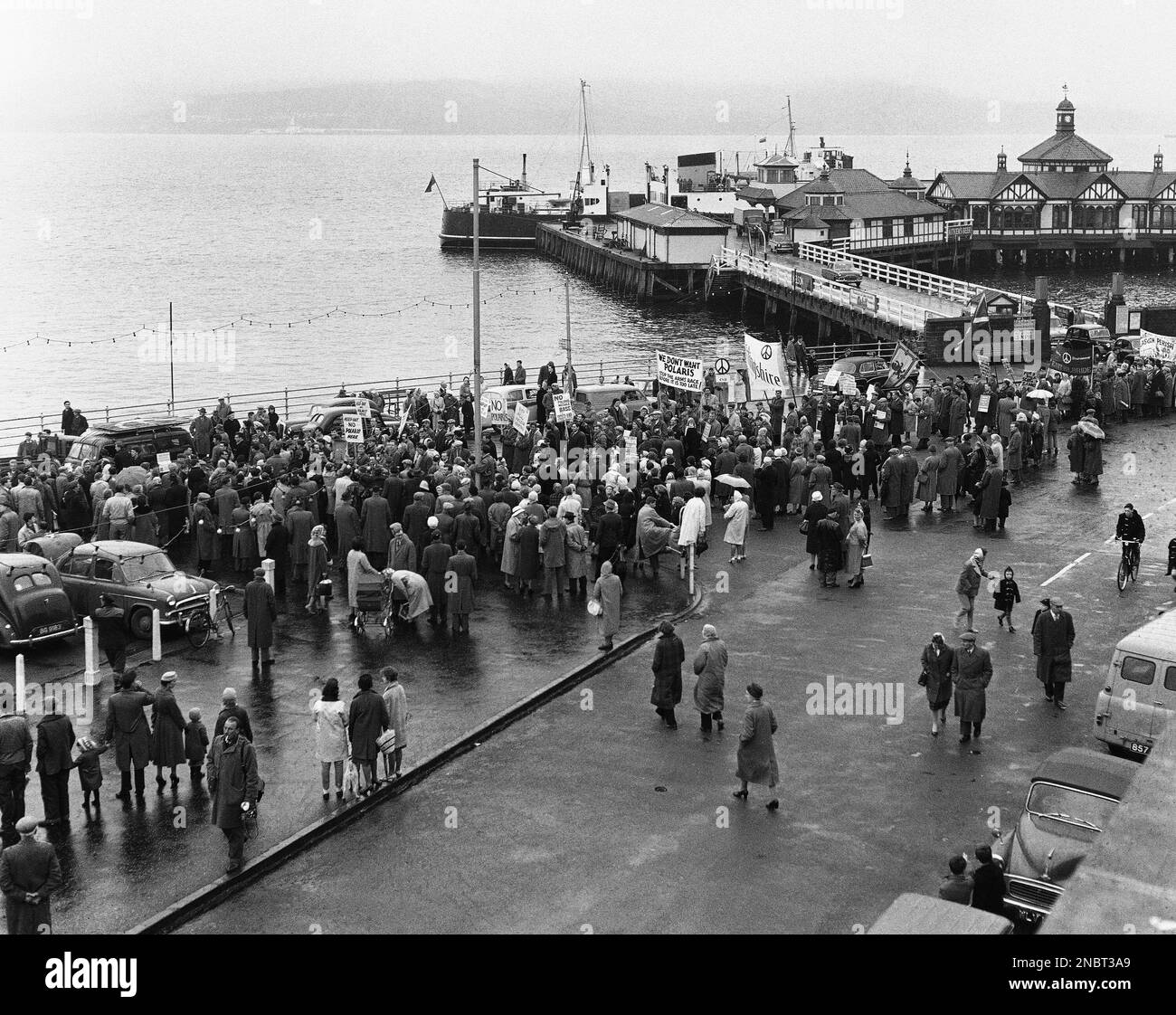 Anti-Polaris demonstrators form a procession at the pier head in Dunoon ...