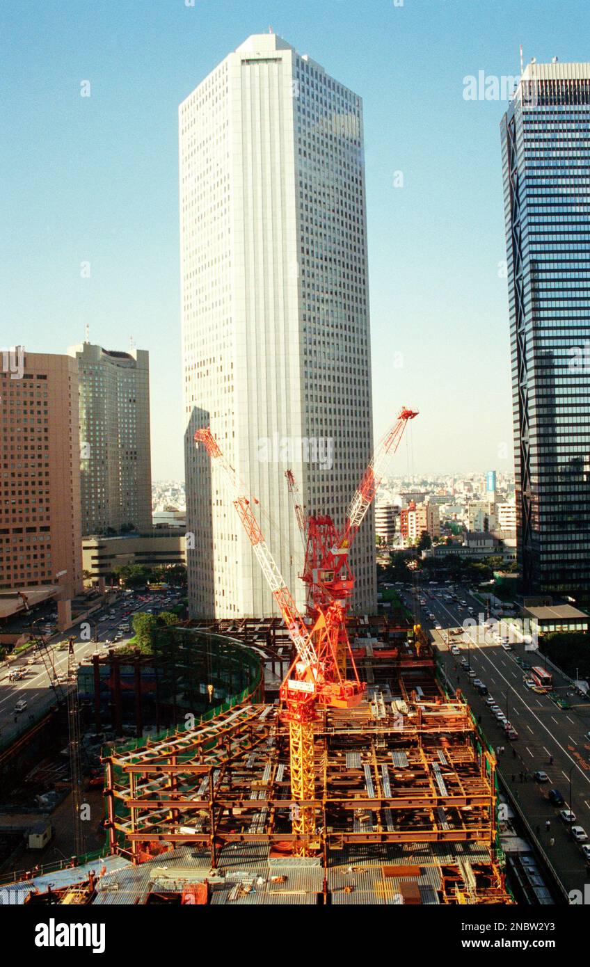 Skyscrapers tower over a construction site in Shinjuku, western part of ...