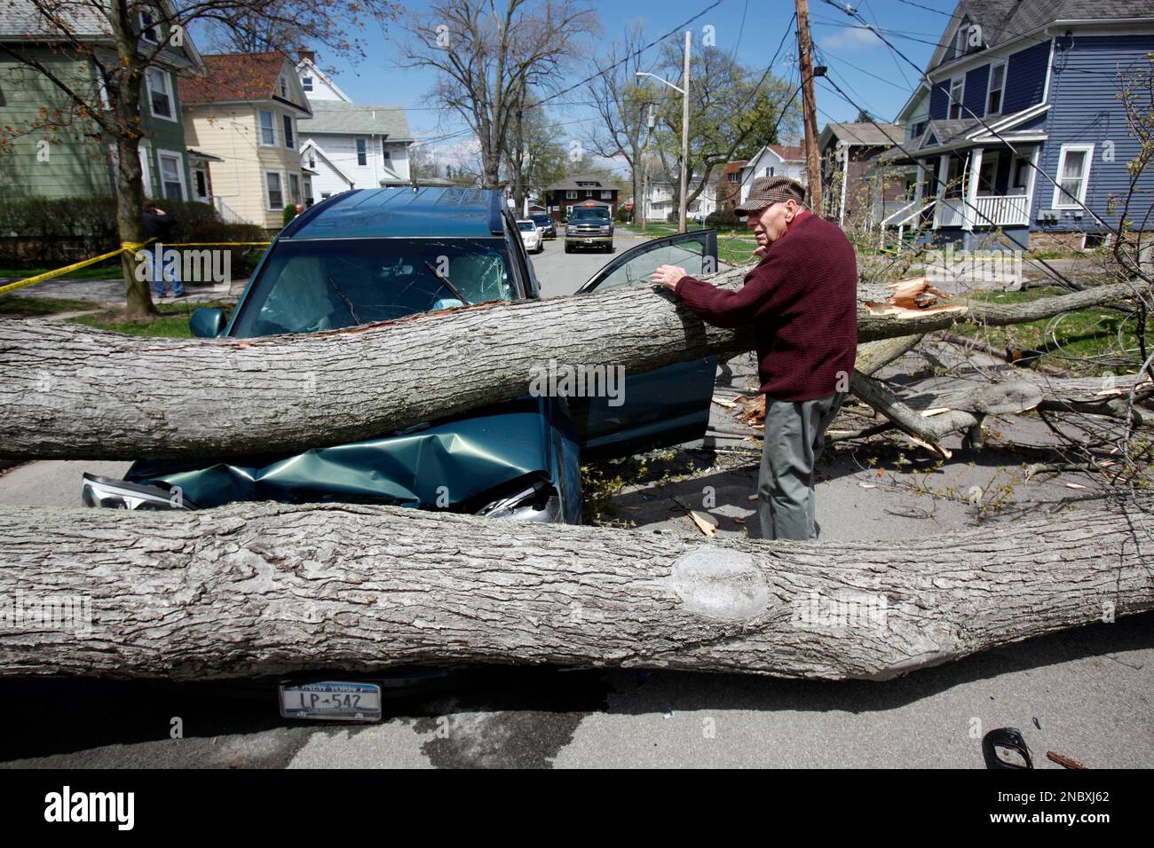 Fred Rankie surveys the damage to a vehicle driven by his daughter ...