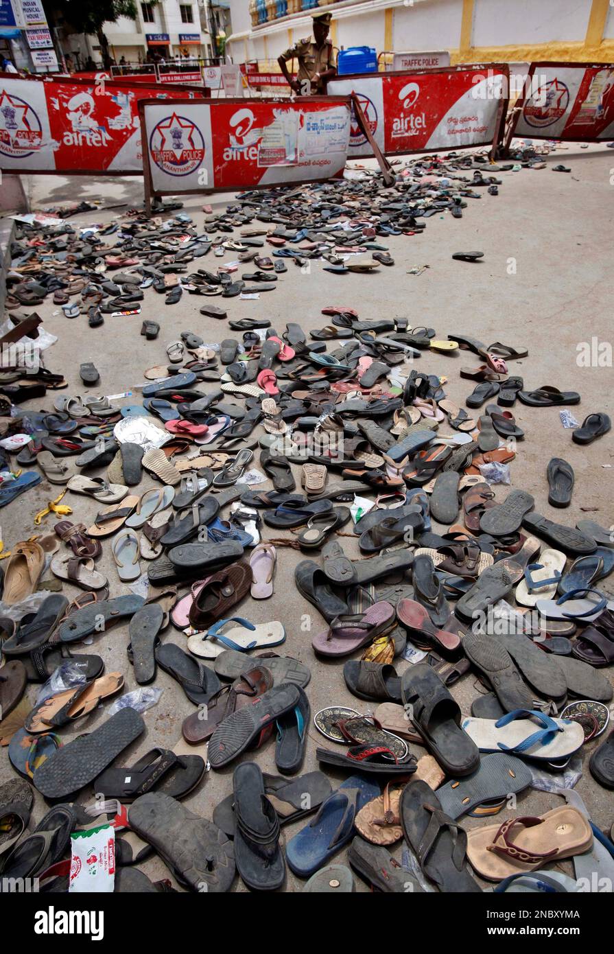 Footwear left by devotees of Indian religious leader Sathya Sai Baba ...