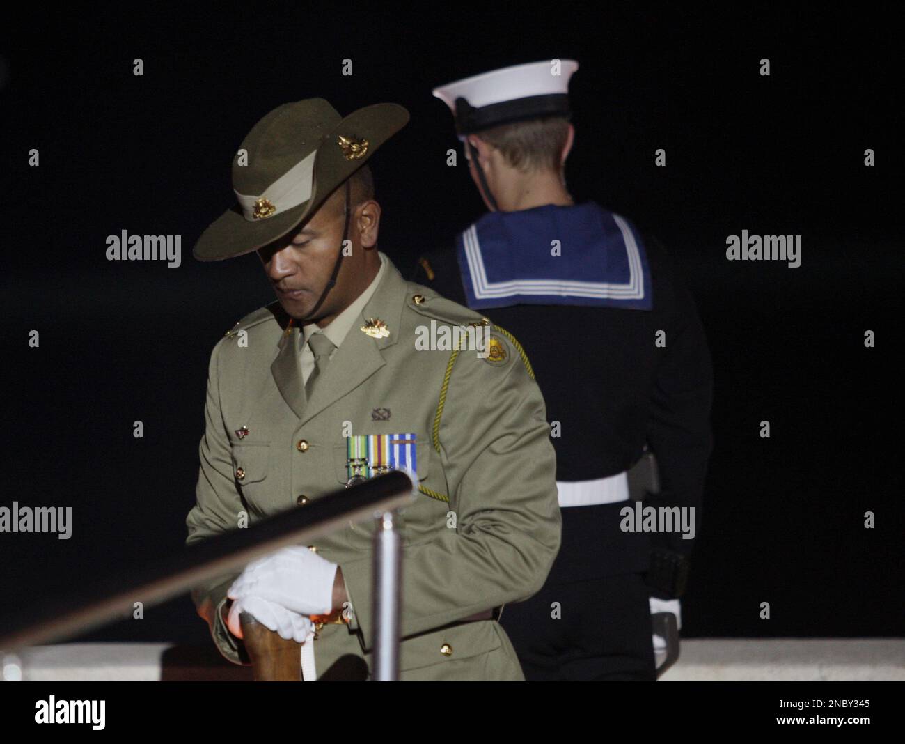 Australian, left, and New Zealand's soldiers stand during the Dawn ...