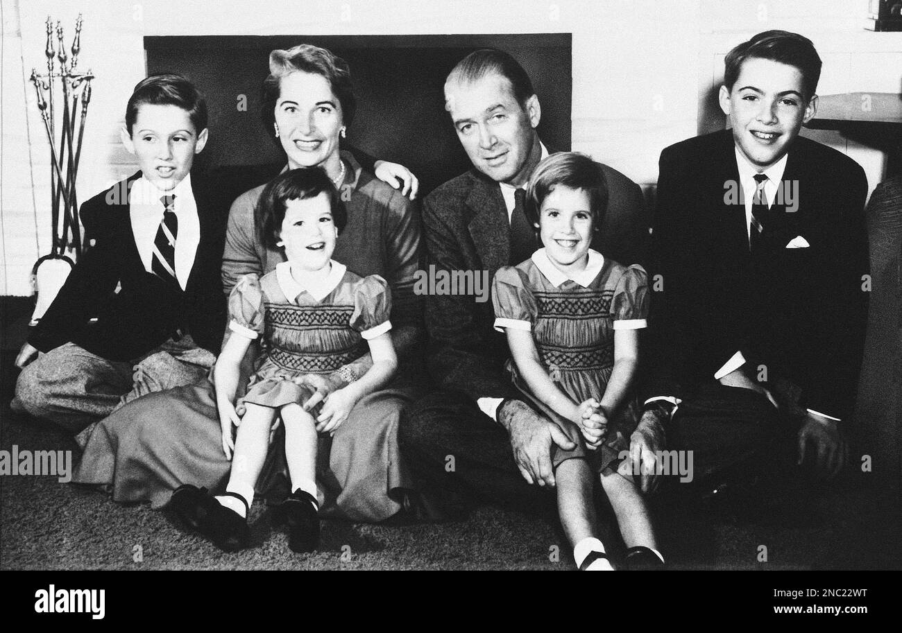 Actor James Stewart poses with his family in 1956. Rear, left to right ...