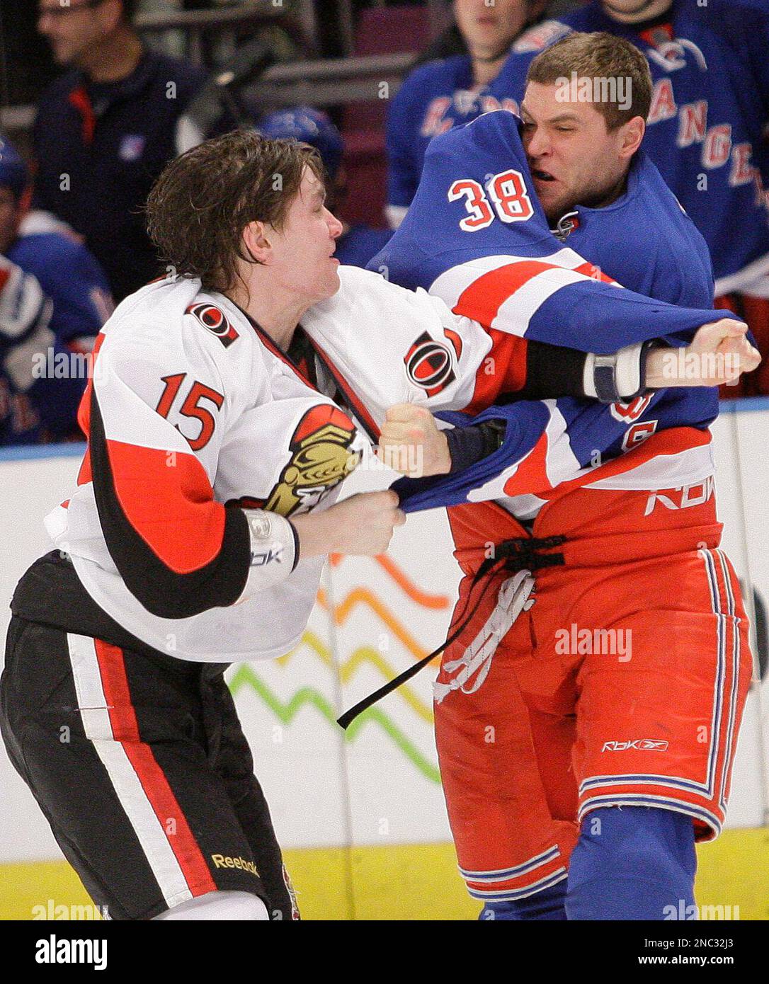Ottawa Senators' Zack Smith (15) fights New York Rangers' Michael Sauer ...