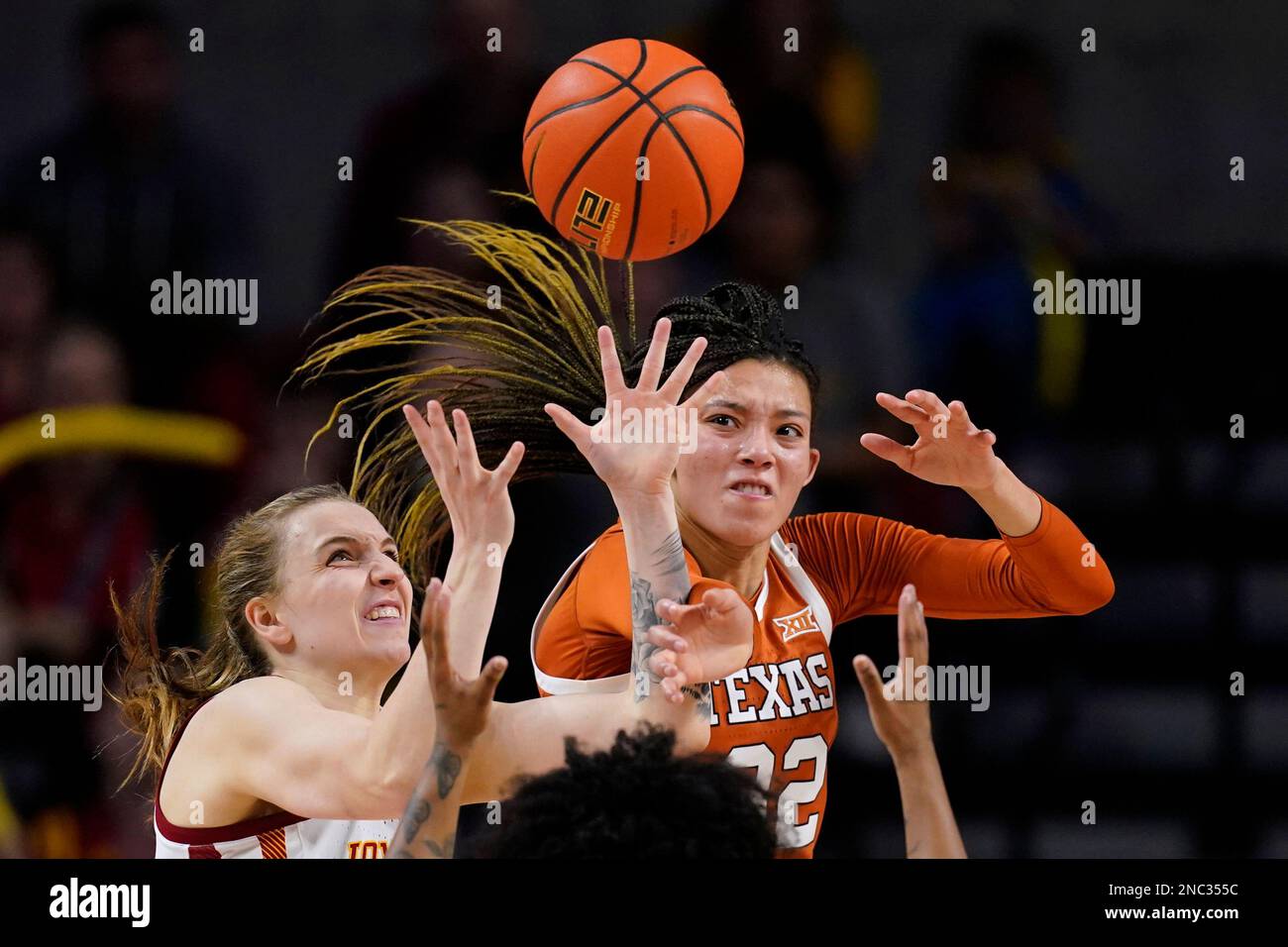 Iowa State guard Denae Fritz, left, fights for a rebound with Texas ...
