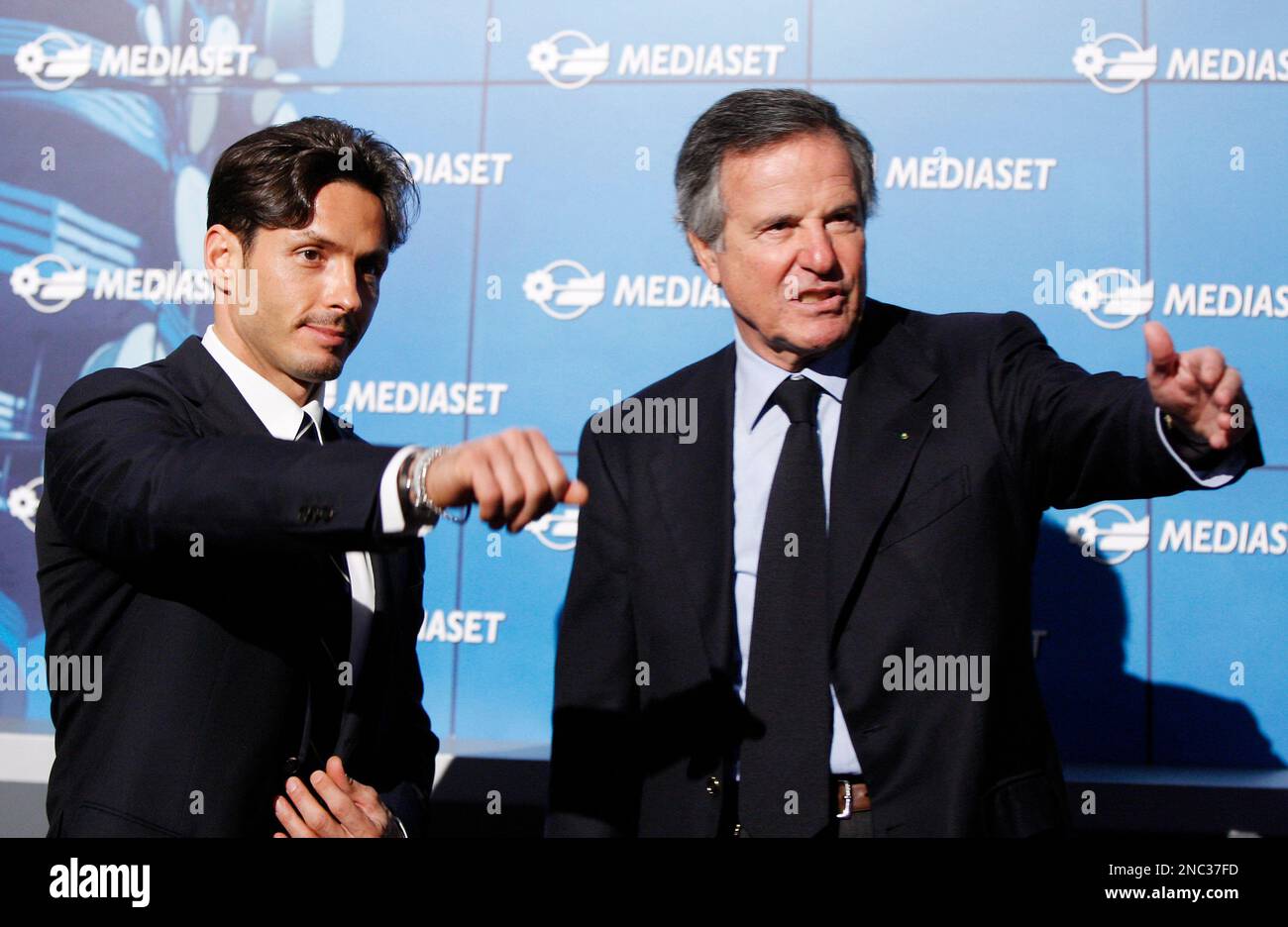 Mediaset vice President Pier Silvio Berlusconi, left, gestures with CEO ...