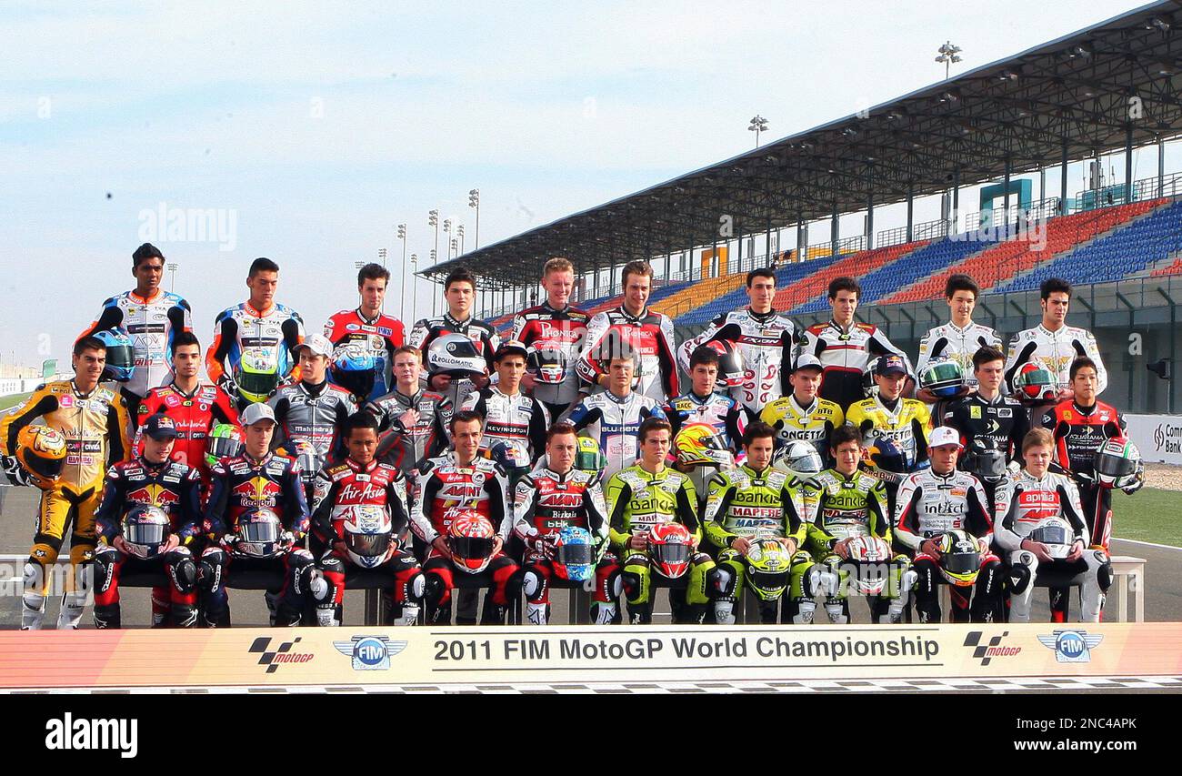 Riders in the 125cc class pose together during the official group photo ...
