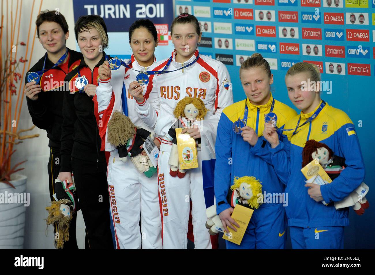 From left, German silver medalists Nora Subschinski and Christin Steuer ...