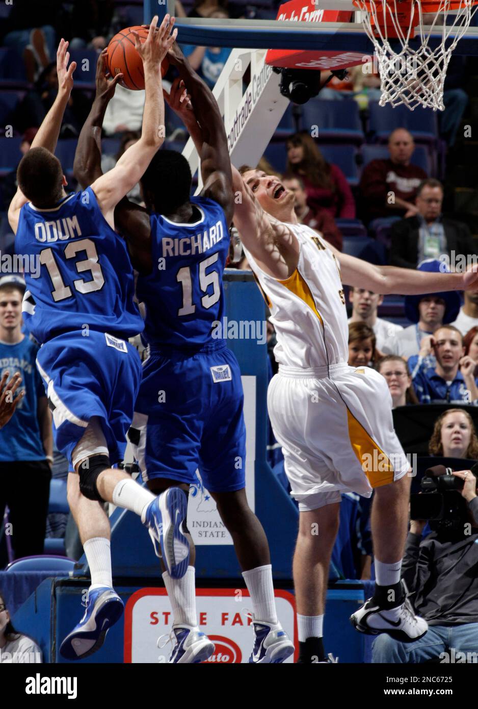 Wichita State's Garrett Stutz, right, reaches back but can't take the ...