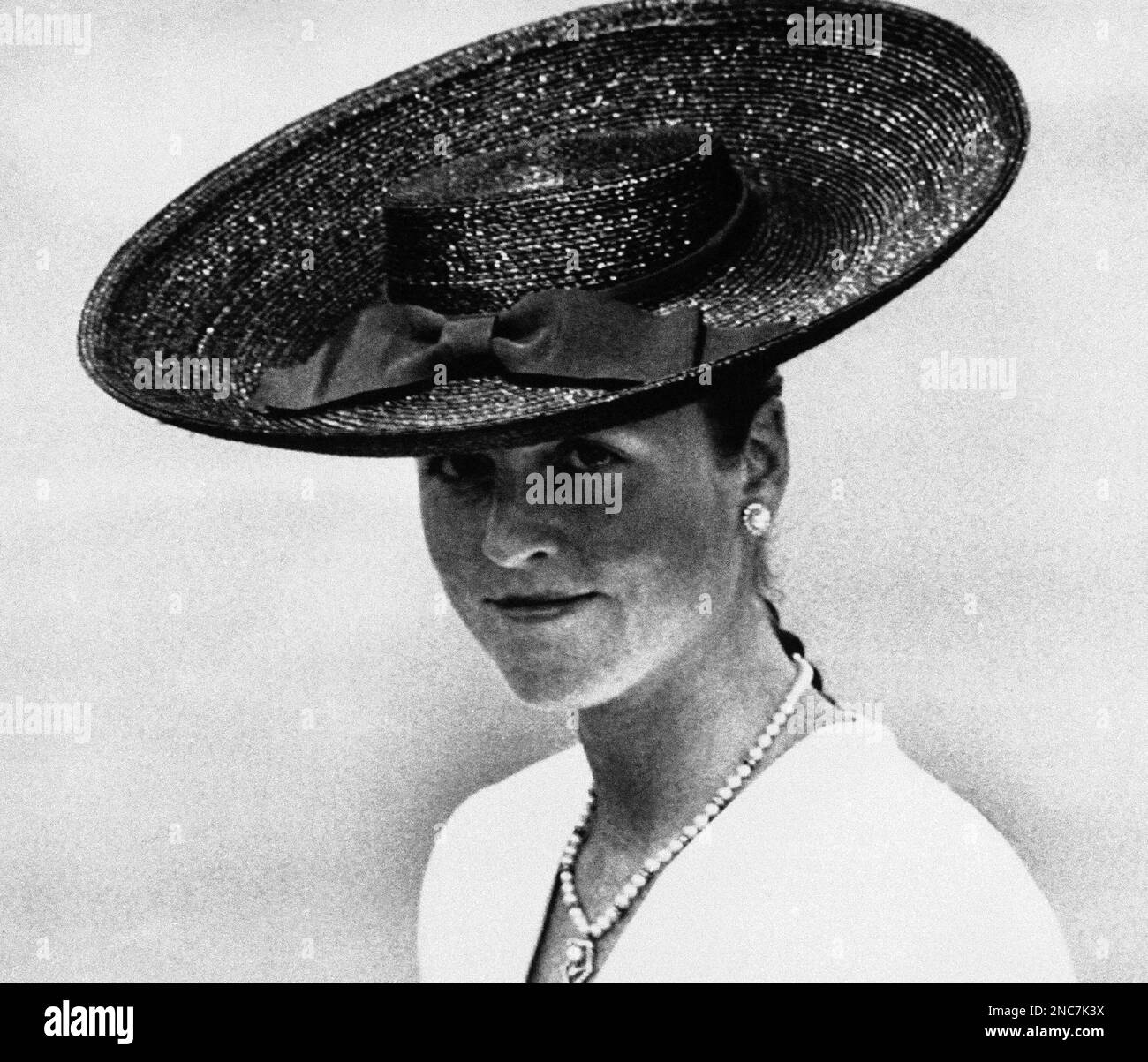 A big black hat protects Sarah, Duchess of York,, wife of England's ...