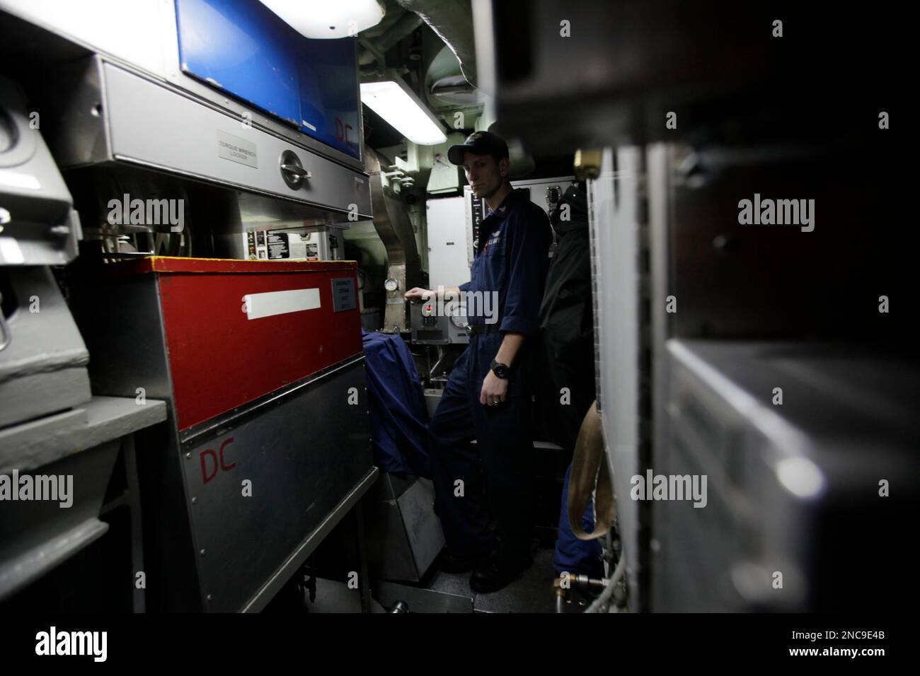 In this photo taken Friday, Feb. 11, 2011, Petty officer Luke Riblet ...