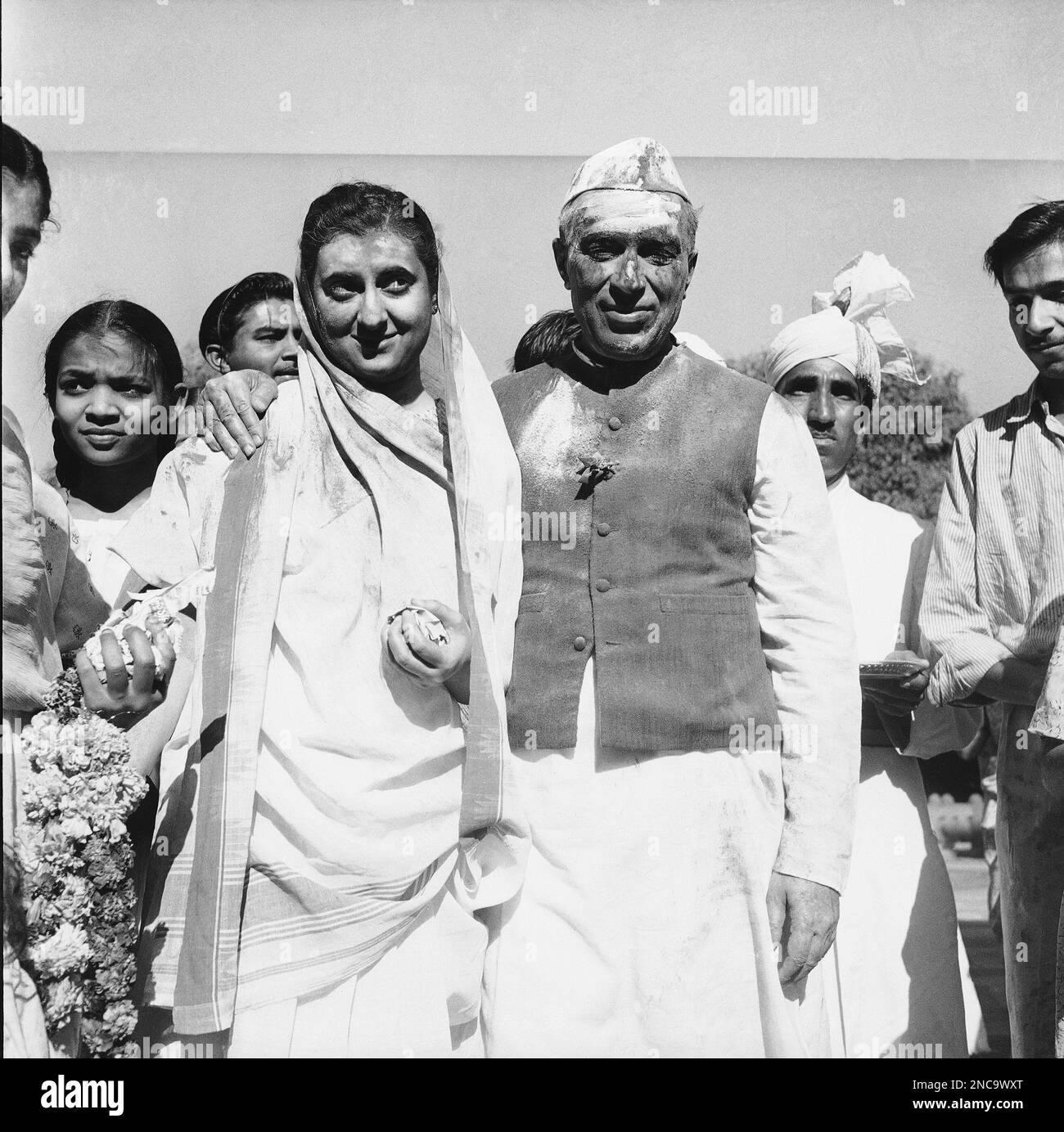 Their faces smeared with powder, Indian Premier Jawaharlal Nehru and ...