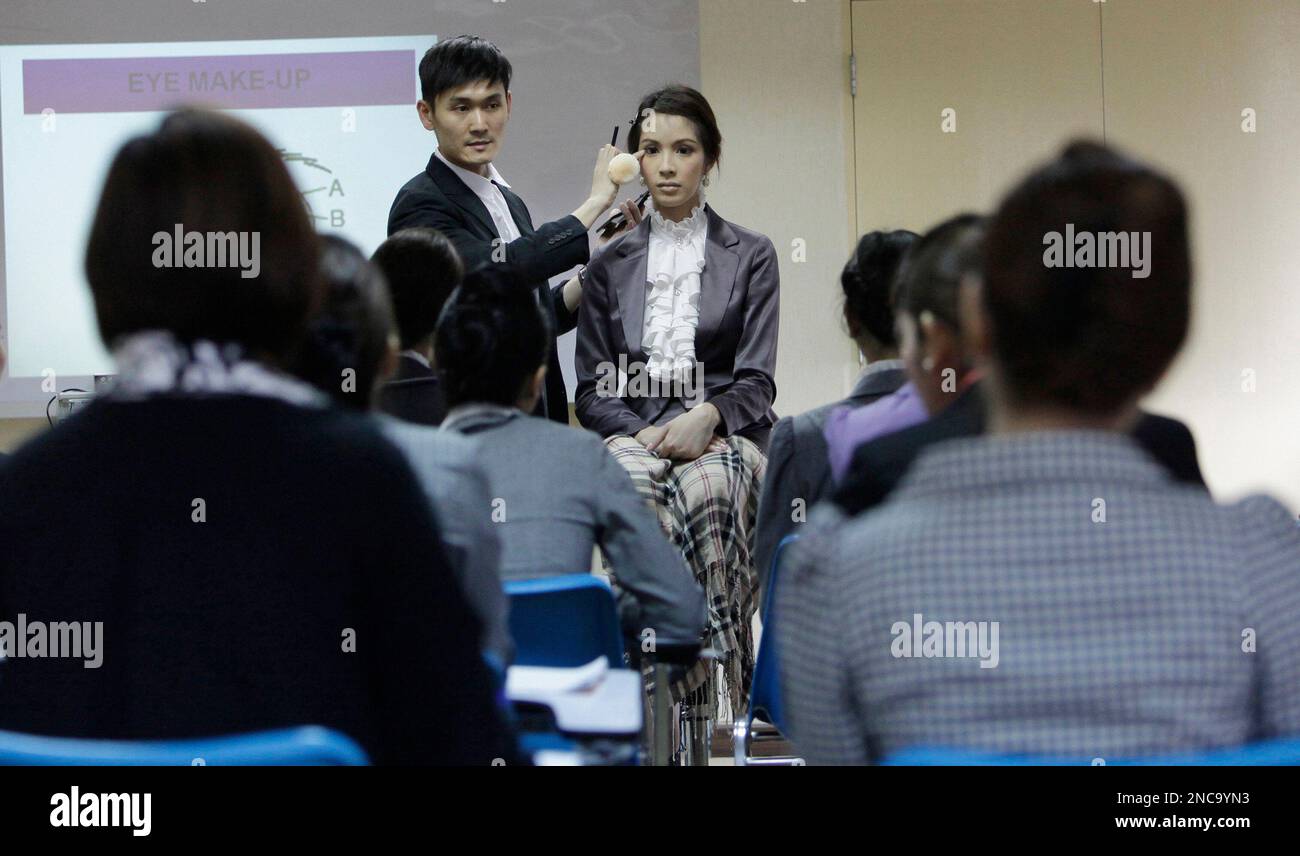 In this Wednesday, Feb. 9, 2011 photo, transvestite Dissanai ...