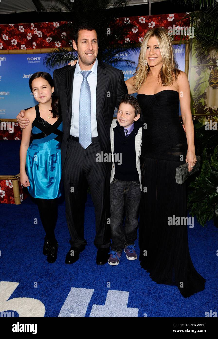 From left, actors Bailee Madison, Adam Sandler, Griffin Alexander Gluck ...